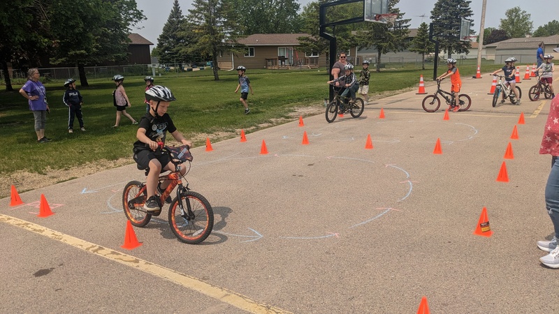 Second graders practice bike safety at Bike Rodeo | Central DeWitt ...