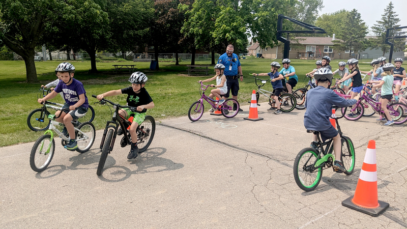 Second graders practice bike safety at Bike Rodeo | Central DeWitt ...